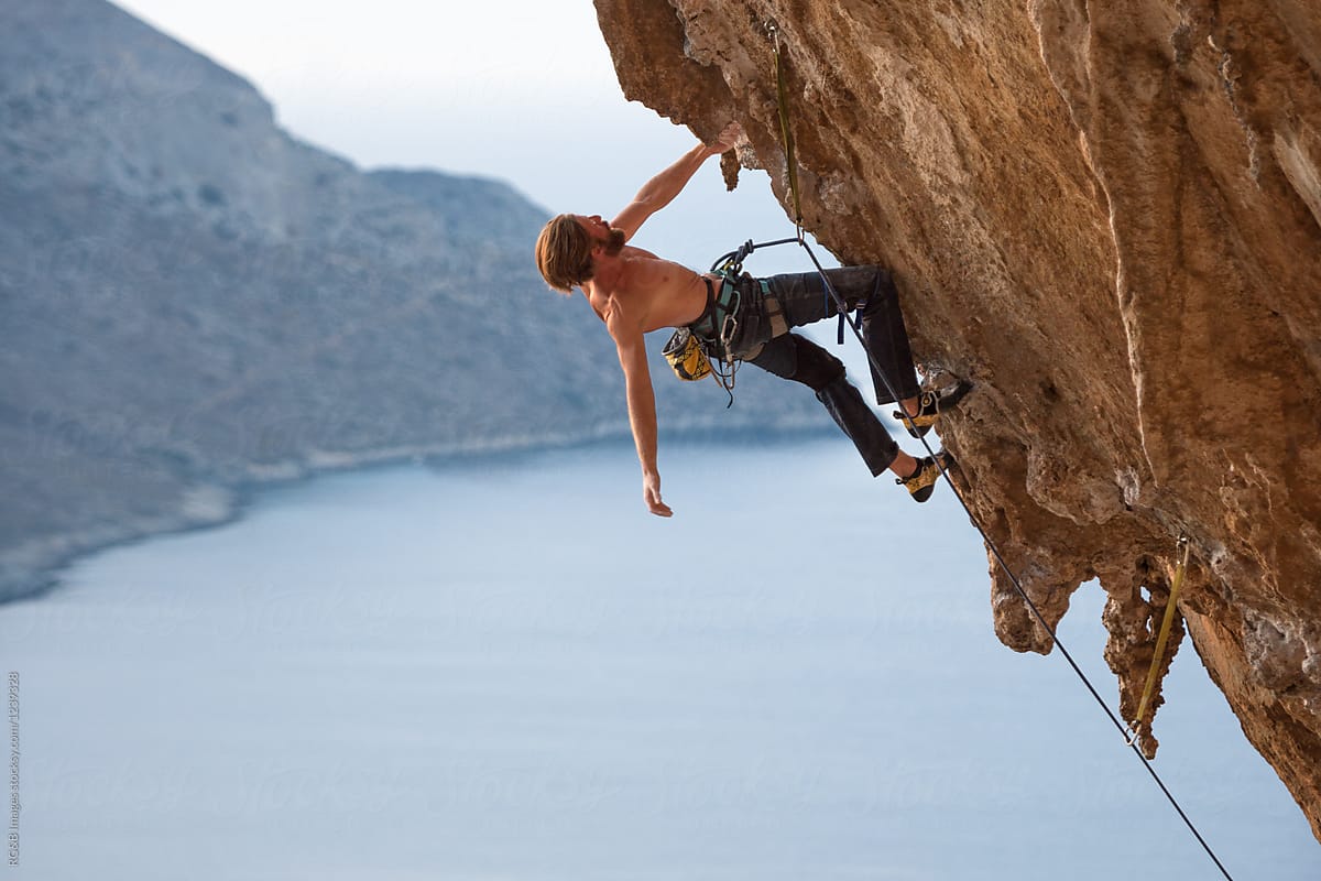 "Powerful Rock Climber On A Overhanging Wall" by Stocksy Contributor ...