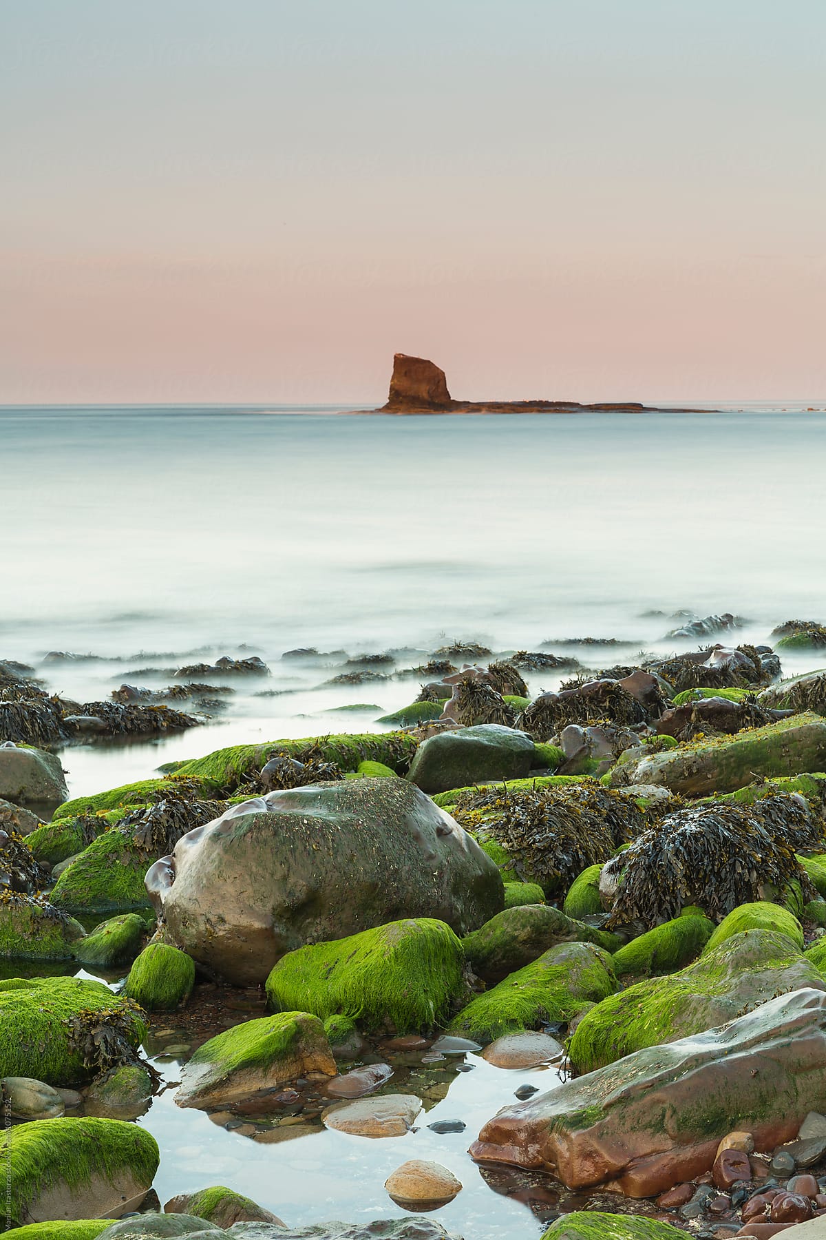 "Saltwick Bay Beach" by Stocksy Contributor "Marilar Irastorza" - Stocksy