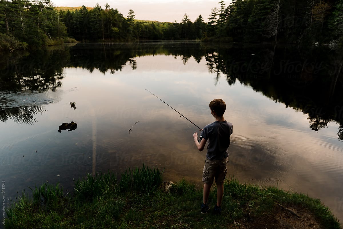"Teen Fishing At Sunset" by Stocksy Contributor "Lea Jones" - Stocksy