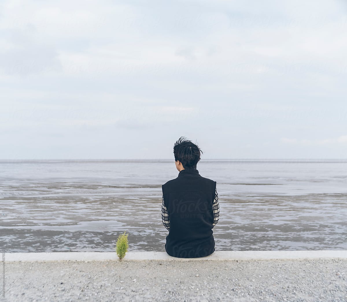 "Woman Sitting On The Road Outdoor" by Stocksy Contributor "Vuelyfe ...