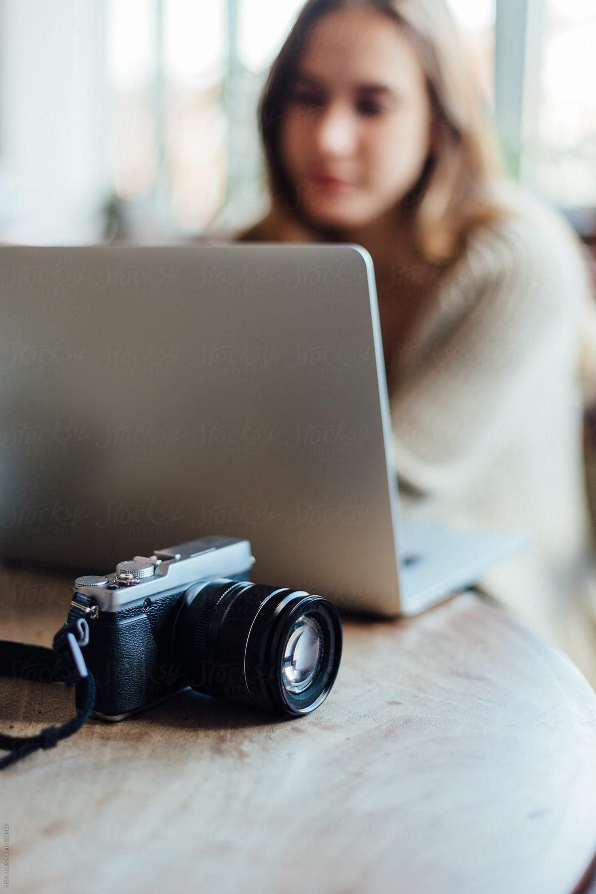 "Female Photographer With Laptop In A Coffe Shop" by Stocksy ...