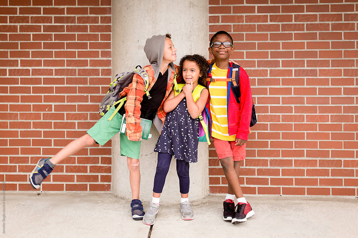"Siblings Pose For Back To School Photo" by Stocksy Contributor ...