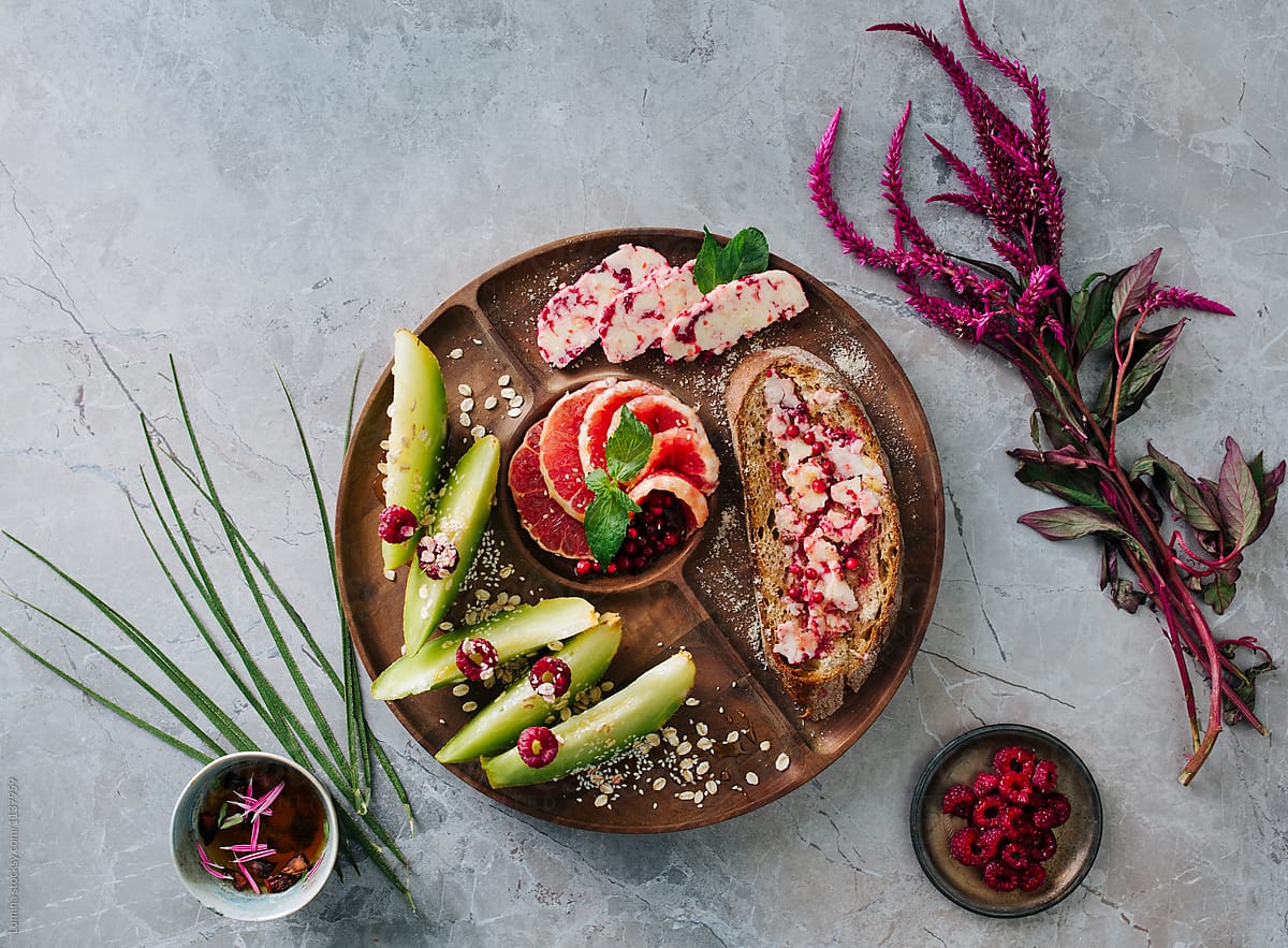 "Food Served On Tapas Wooden Plate" by Stocksy Contributor "Lumina ...