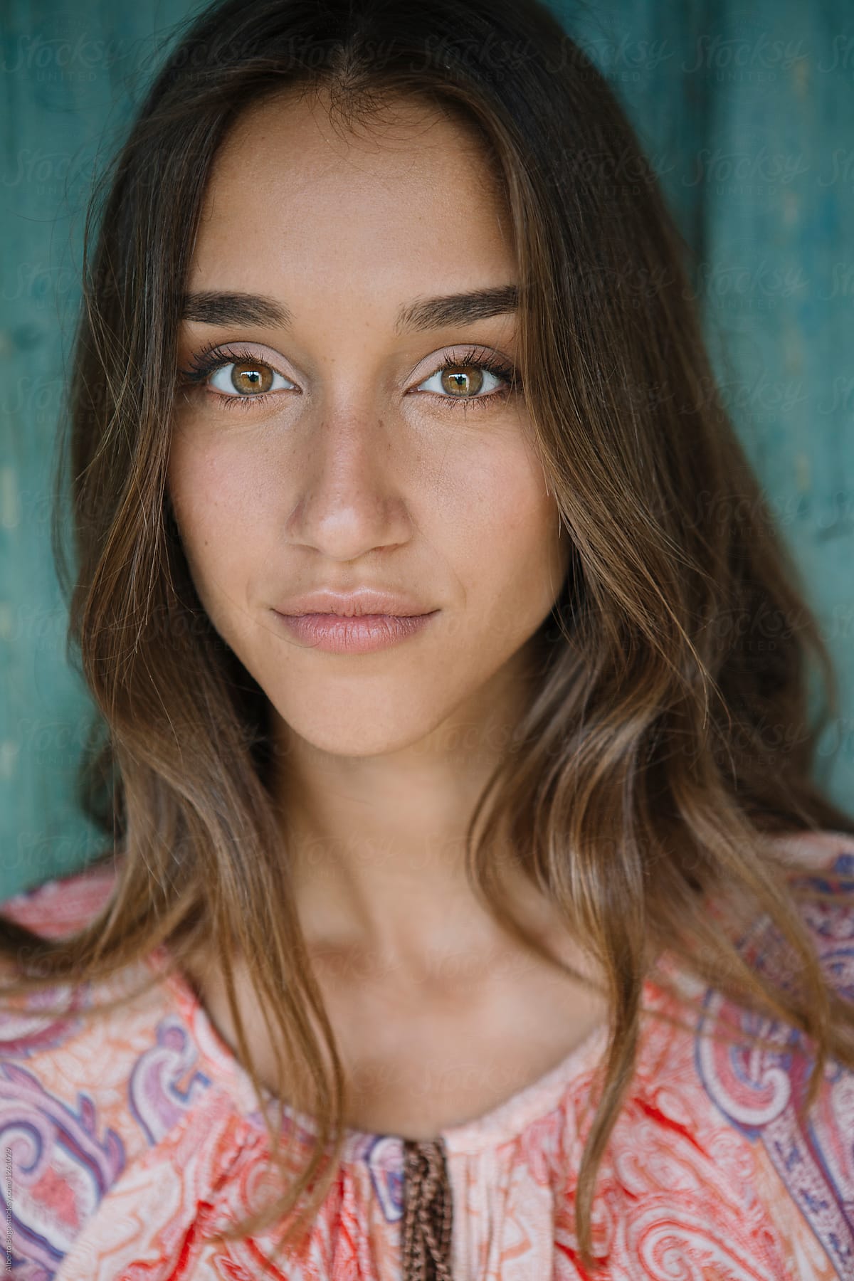 "Woman Looking At Camera At Wooden Door" by Stocksy Contributor "Studio ...