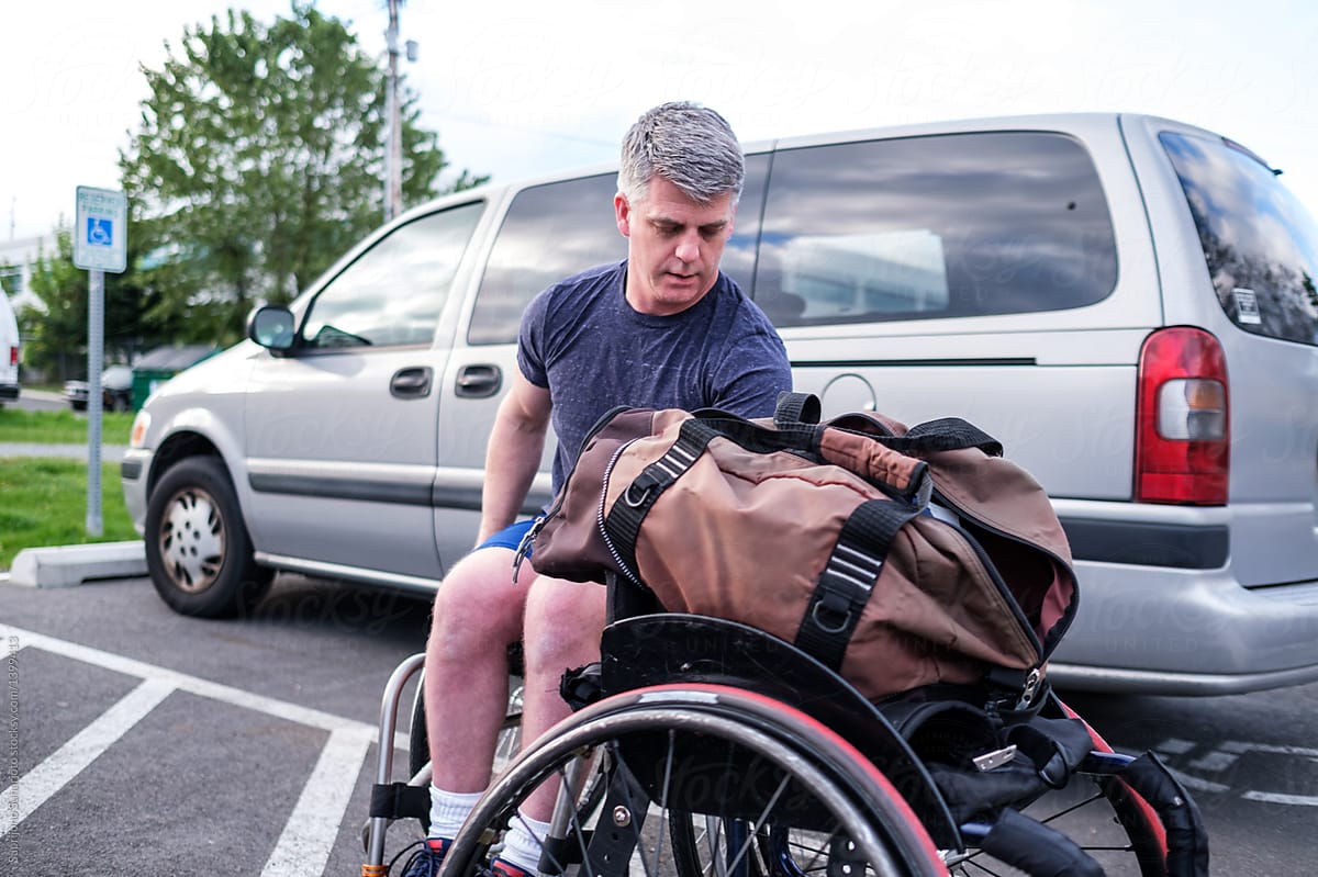 "Active Disabled Athlete Taking Out Wheelchair From His Car" by Stocksy ...