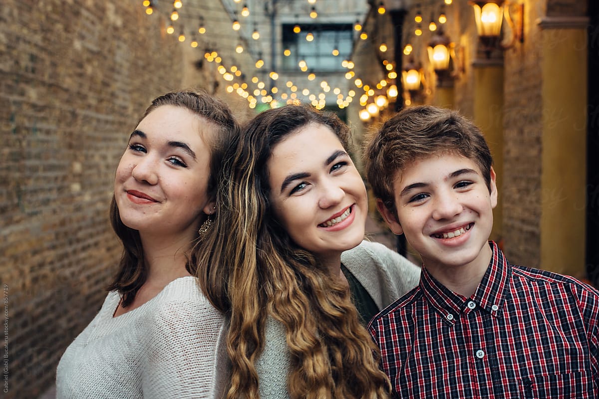 "Smiling Teenage Girls And Boy In An Alley" by Stocksy Contributor ...