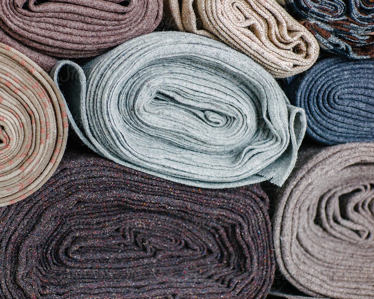 "Bunch Of Cloth Rolls" by Stocksy Contributor "Duet Postscriptum" - Stocksy