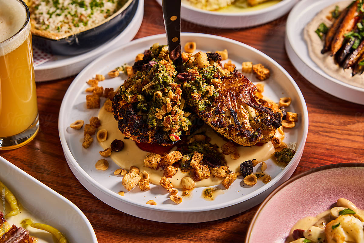 "Modern Feast: Elevated Comfort Food In A Warm Restaurant Setting" by ...