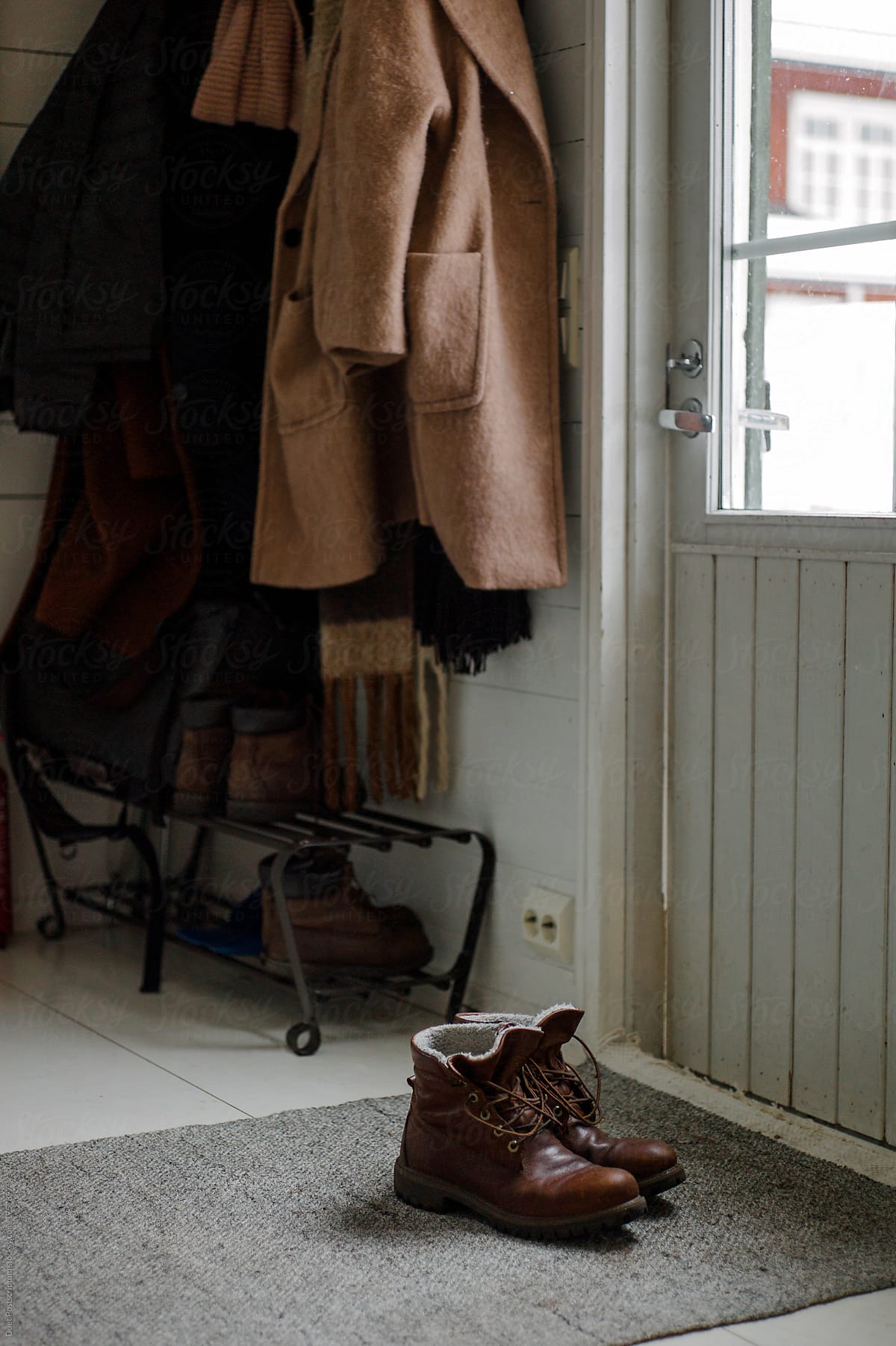 "Hallway With Coats On Hangers" by Stocksy Contributor "Duet ...