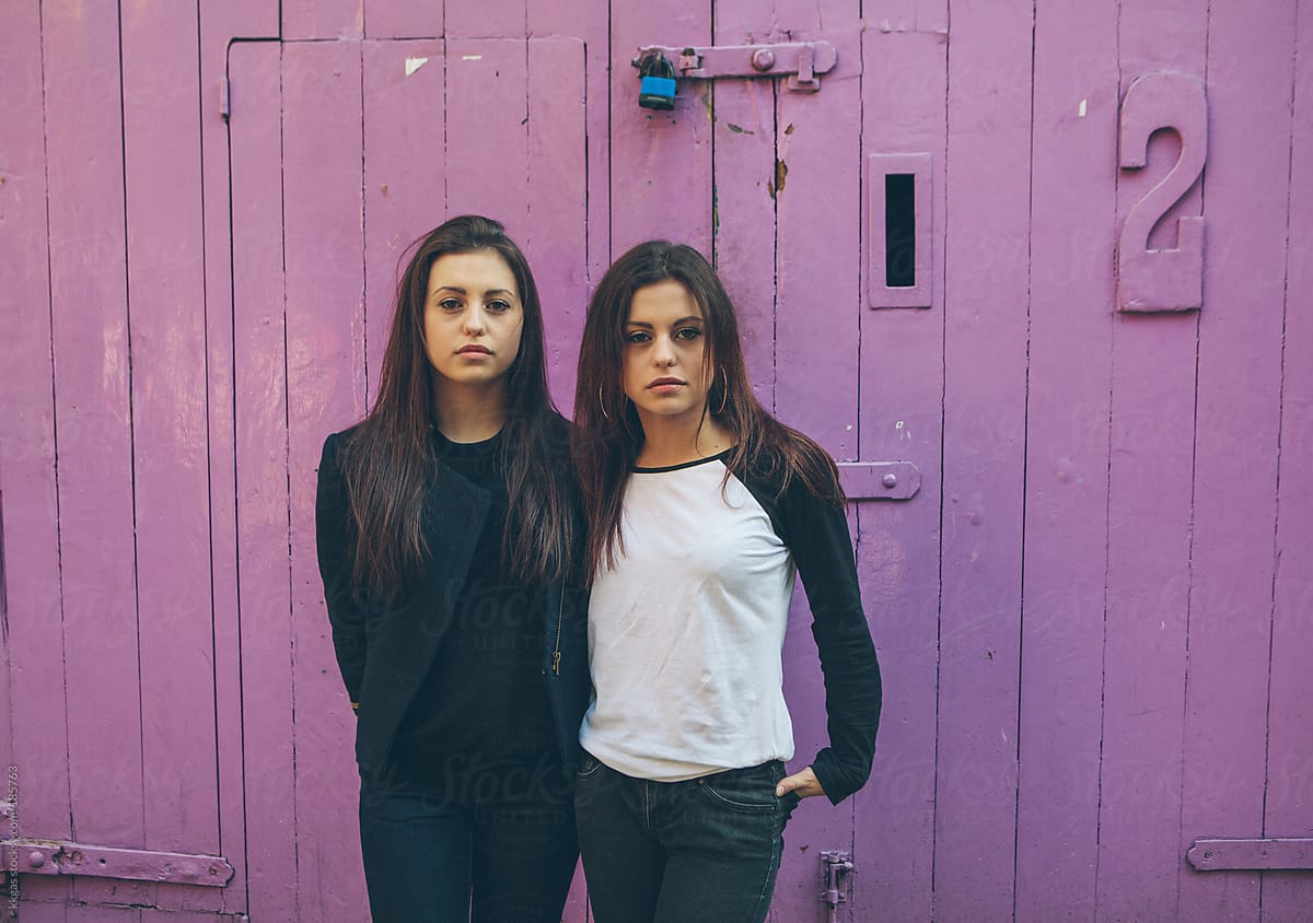 "Twin Teenage Girls Side By Side" by Stocksy Contributor "Kkgas" - Stocksy