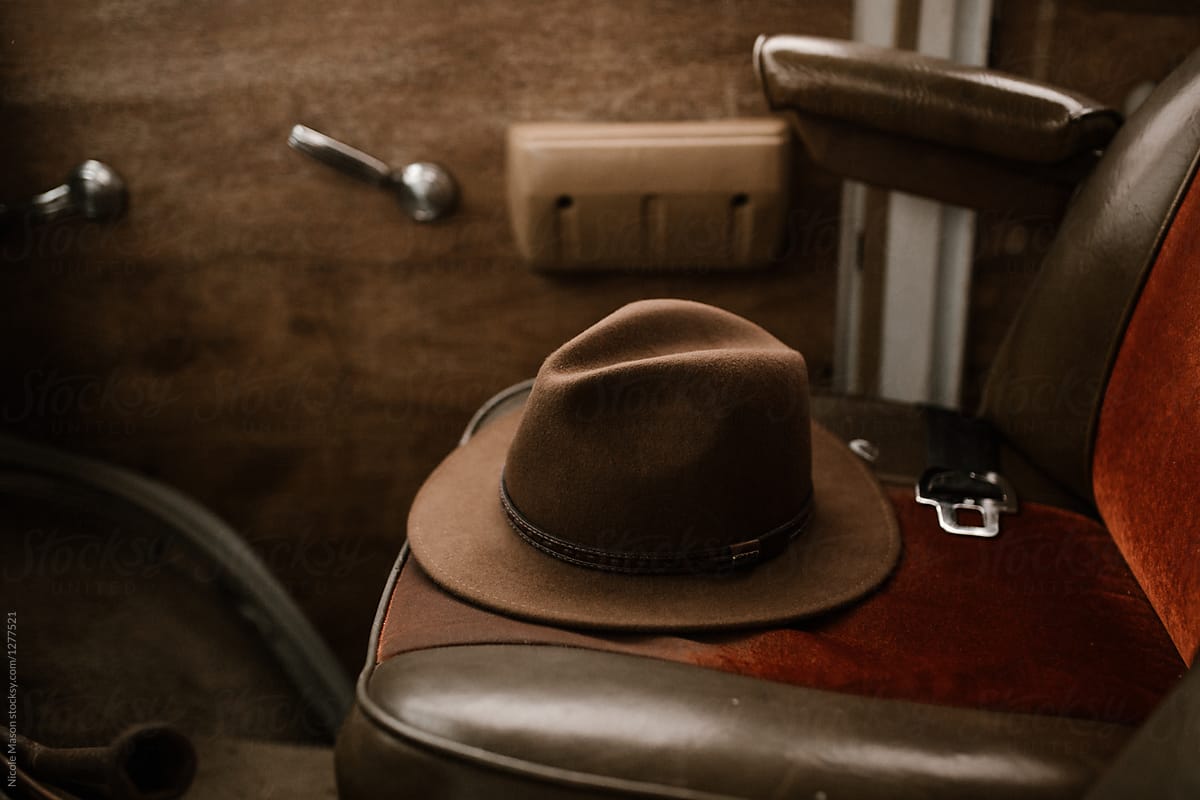 "Western Hat Sitting On Seat Of Vehicle" by Stocksy Contributor "Nicole ...