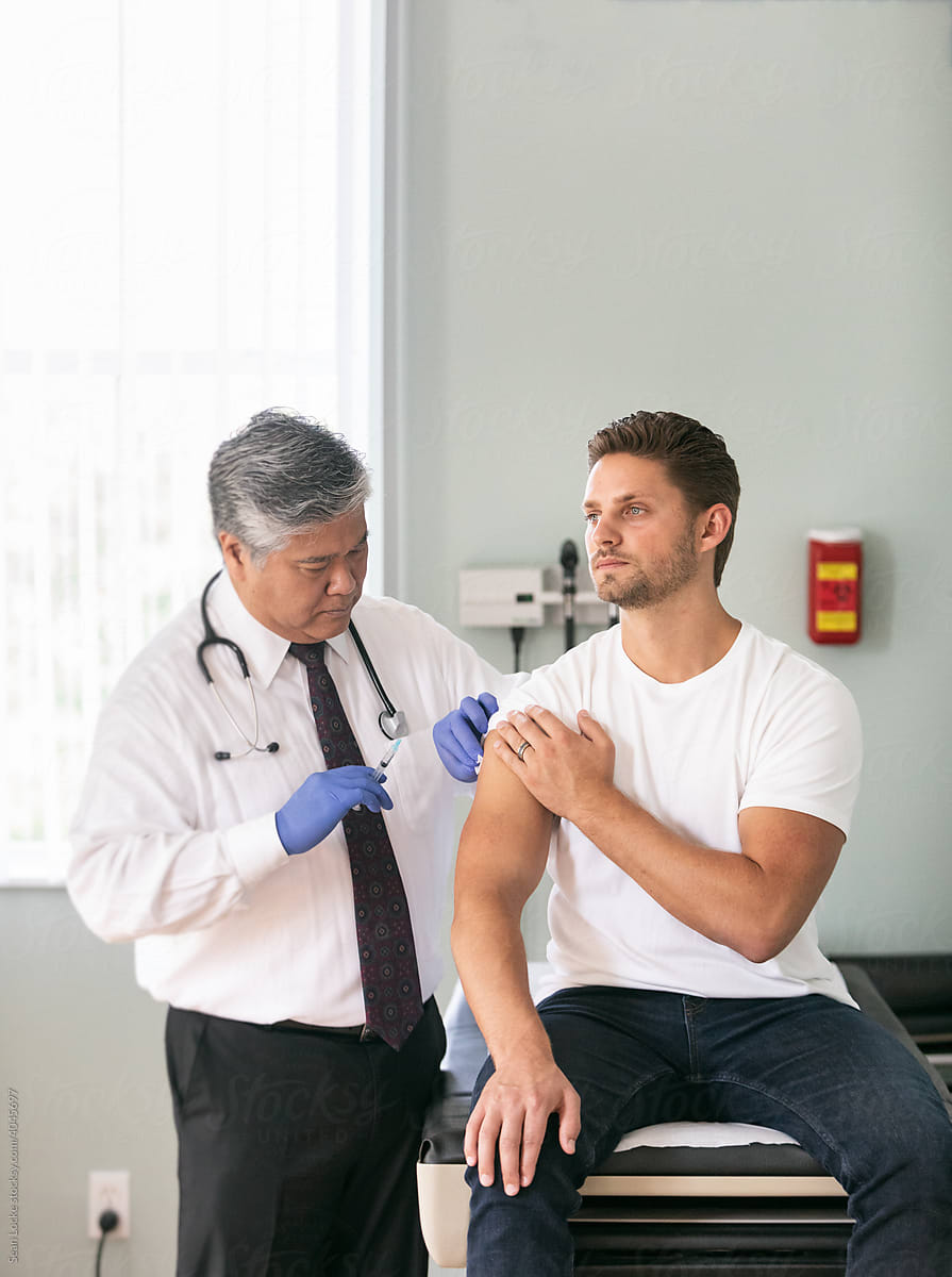 "Exam: Doctor Ready To Administer Vaccine" by Stocksy Contributor "Sean ...