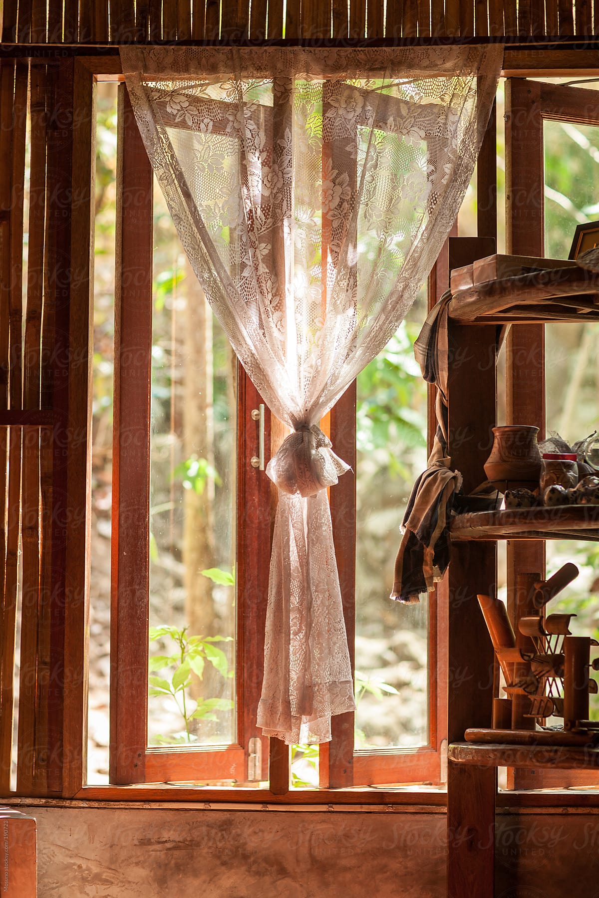 "Window In The Morning Sun" by Stocksy Contributor "Mosuno" - Stocksy