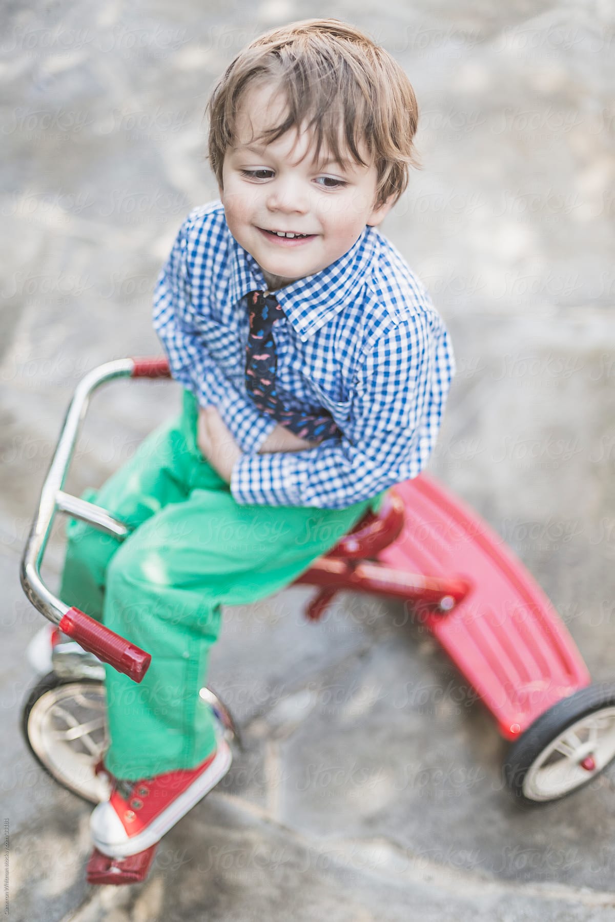 "Dapper Toddler Boy On His Tricycle" by Stocksy Contributor "CWP, LLC ...