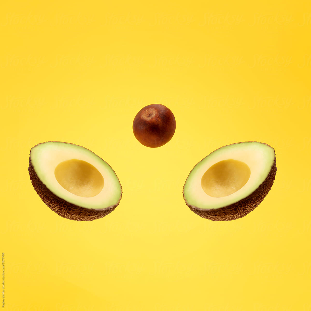 "Split Avocado" by Stocksy Contributor "Pepino De Mar Studio" - Stocksy