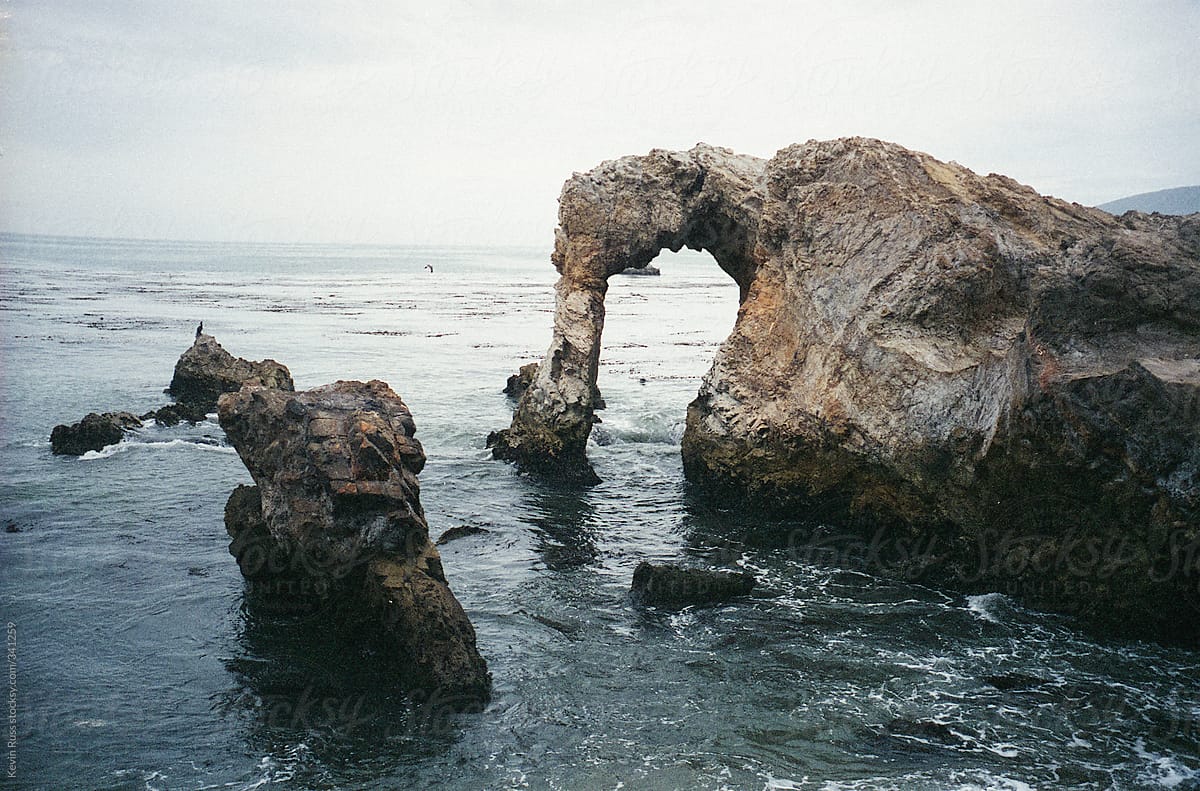 "Rock Formations In Ocean" by Stocksy Contributor "Kevin Russ" - Stocksy