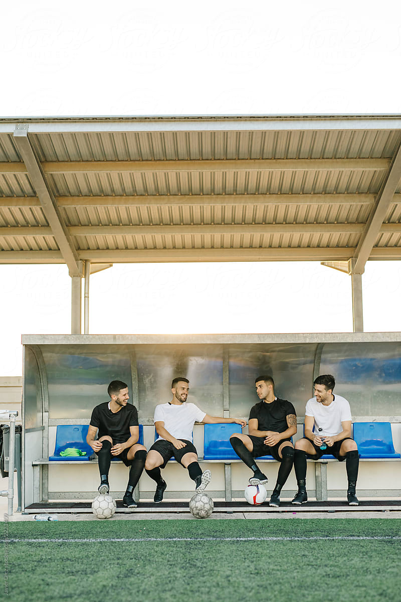 "Soccer Players Resting During Training" by Stocksy Contributor "Javier ...