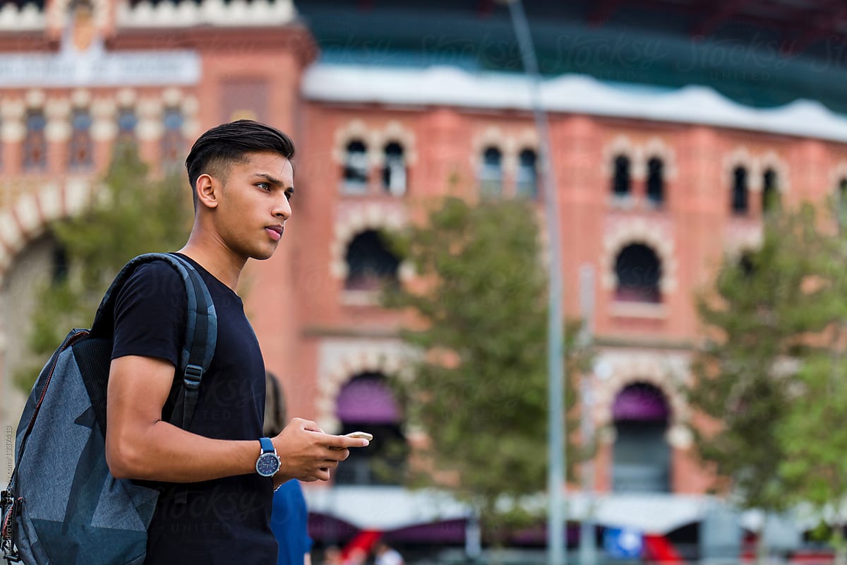 "Man Searching Location In A Map App" by Stocksy Contributor "Ohlamour ...
