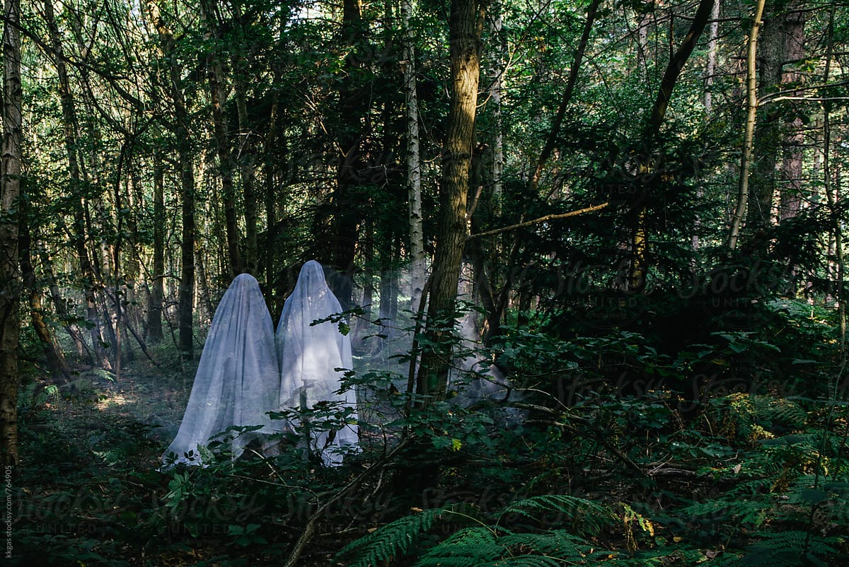 "Halloween Ghosts In The Woods" by Stocksy Contributor "Kkgas" - Stocksy