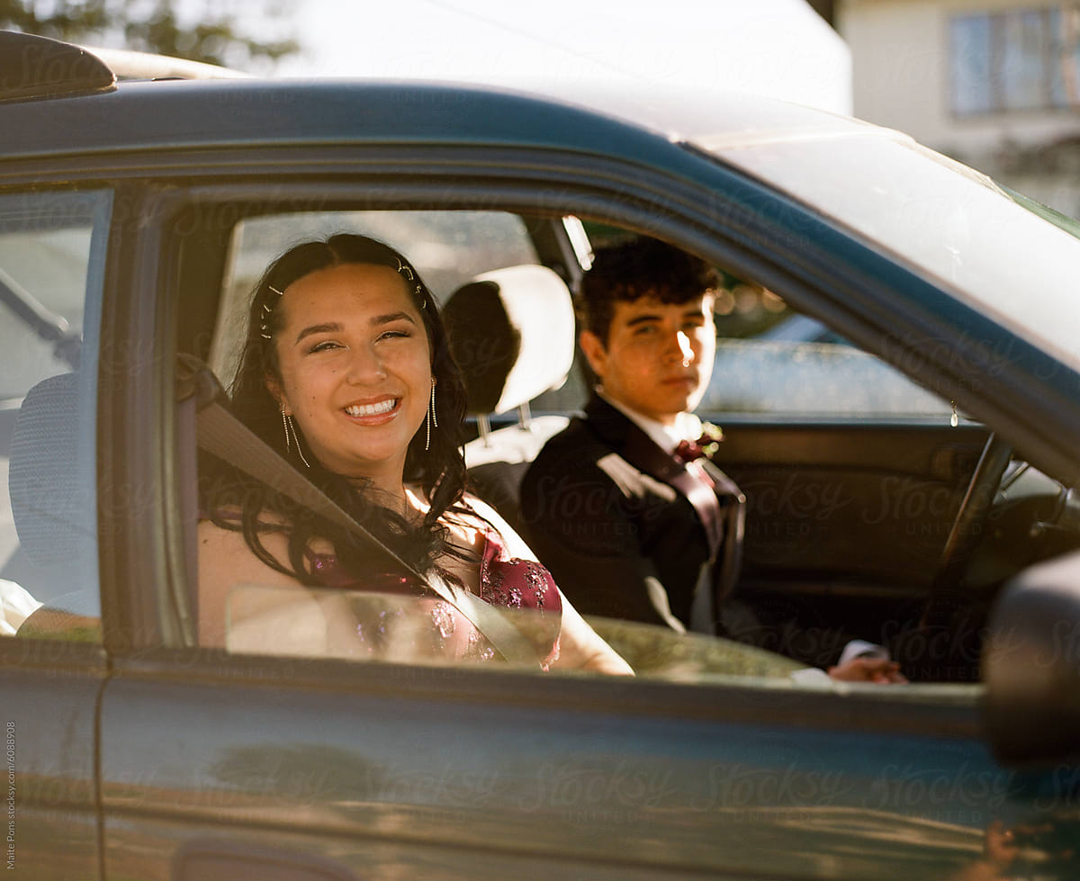 "Teenage Couple Driving To Prom" by Stocksy Contributor "Maite Pons ...