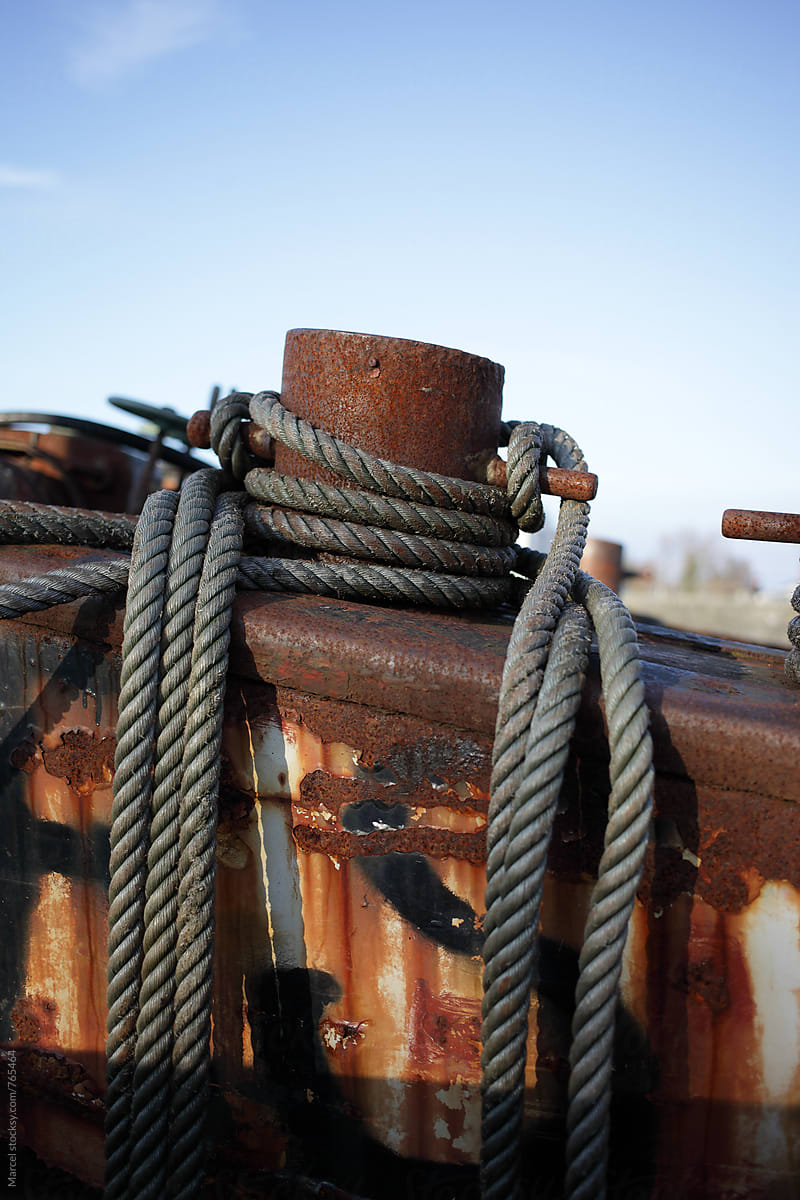 "Rusty Old Ship Tied With Ropes" by Stocksy Contributor "Marcel" - Stocksy