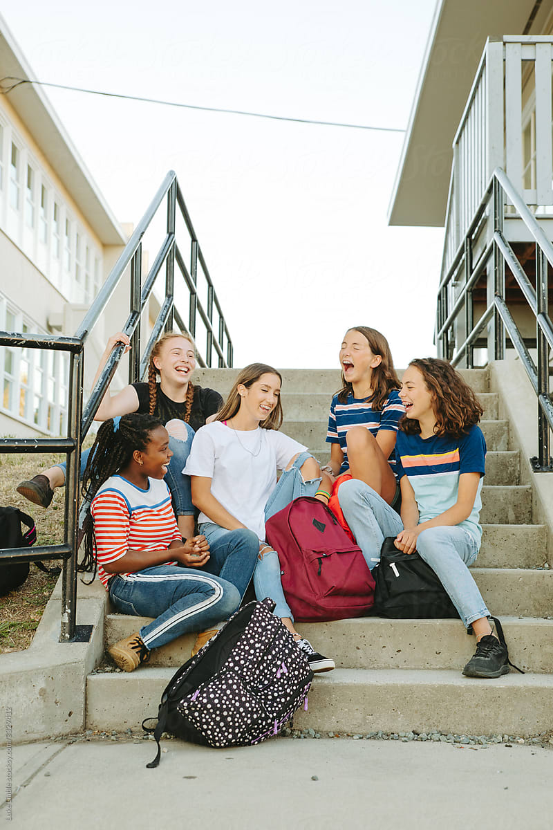 "Group Of Preteens Posing Outside Of School." by Stocksy Contributor ...