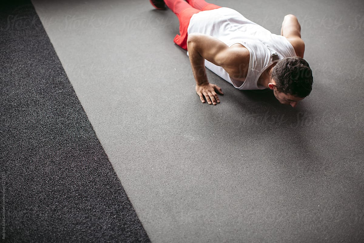 "Young, Healthy Man Working Out In Gym - Pushups" by Stocksy ...