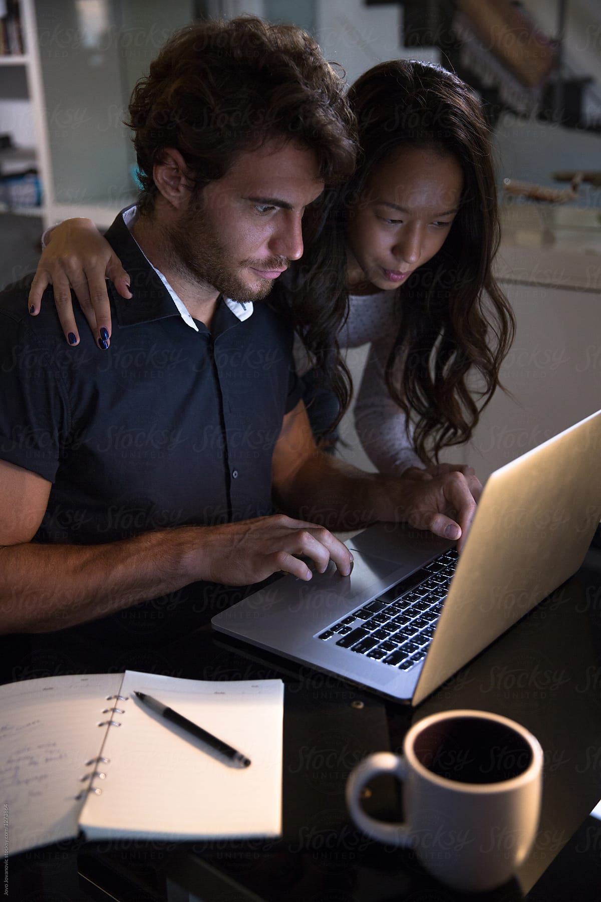 "Couple Checking Something Online" by Stocksy Contributor "Jovo ...