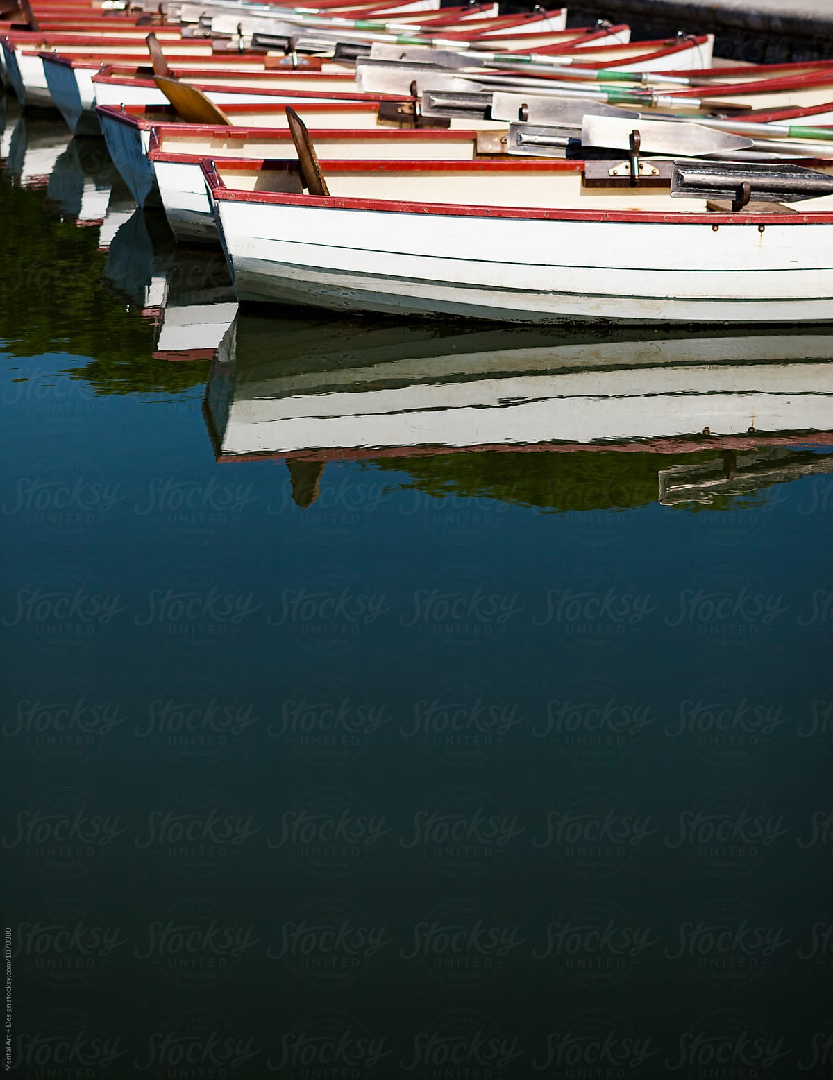 "Row Boats" by Stocksy Contributor "Mental Art + Design" - Stocksy