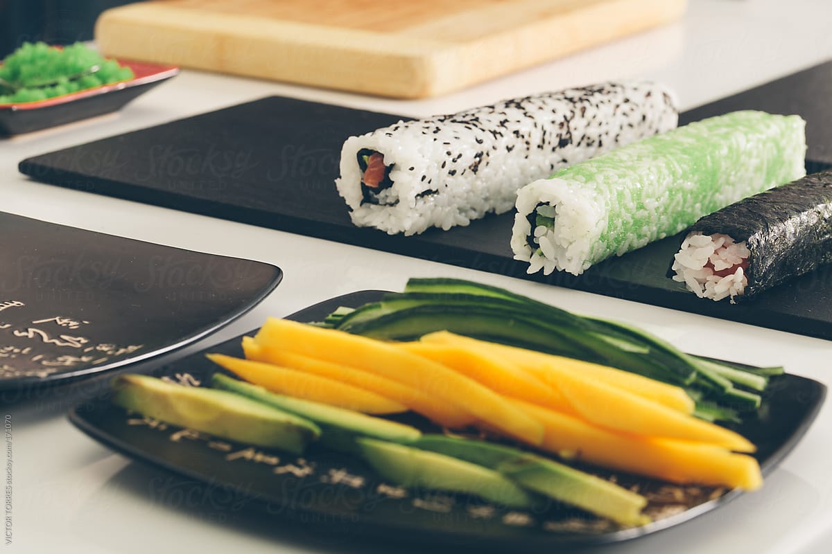 "Maki And Uramaki Rolls" by Stocksy Contributor "VICTOR TORRES" - Stocksy
