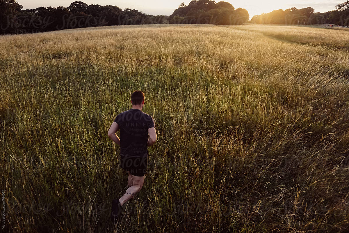 "Man Running In The Park In The Early Morning" by Stocksy Contributor ...