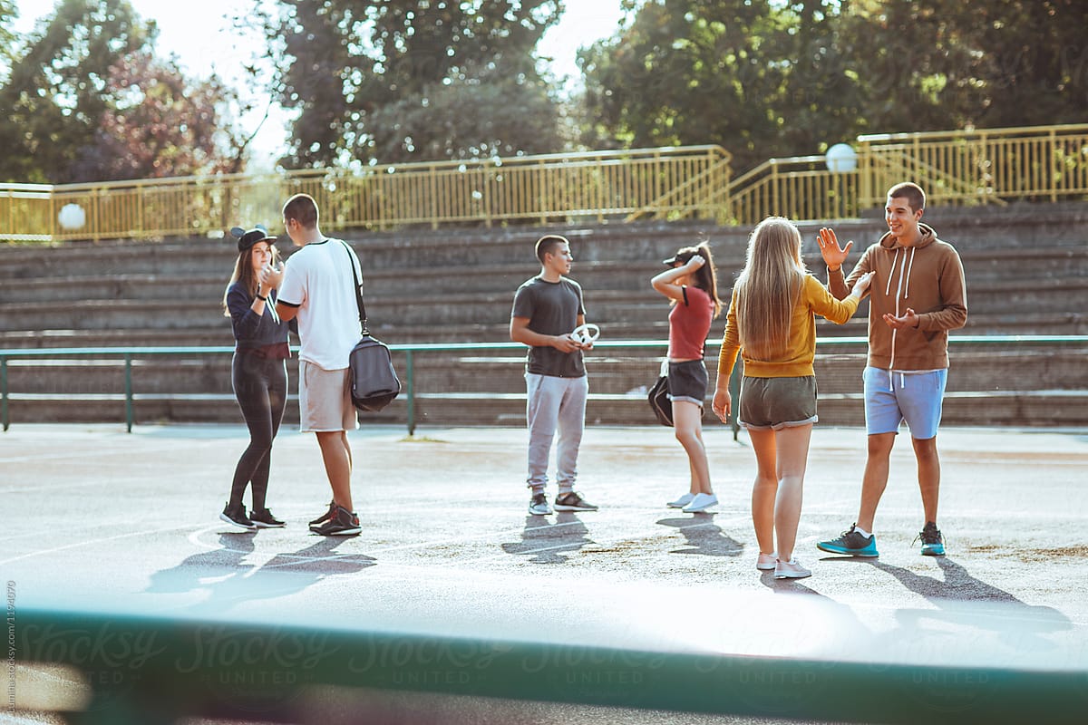 "Group Of High Schoolers In Sport Yard" by Stocksy Contributor "Lumina ...