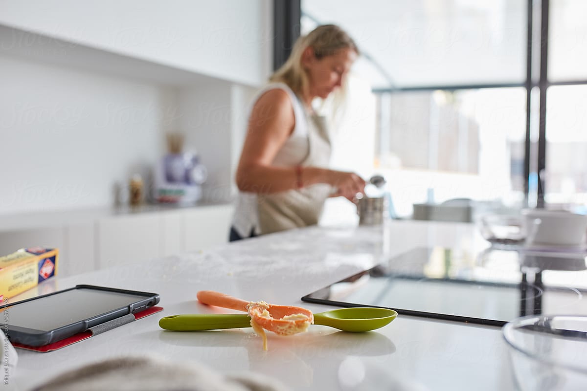 "Woman Baking Homemade Cookies In Her Kitchen" by Stocksy Contributor ...