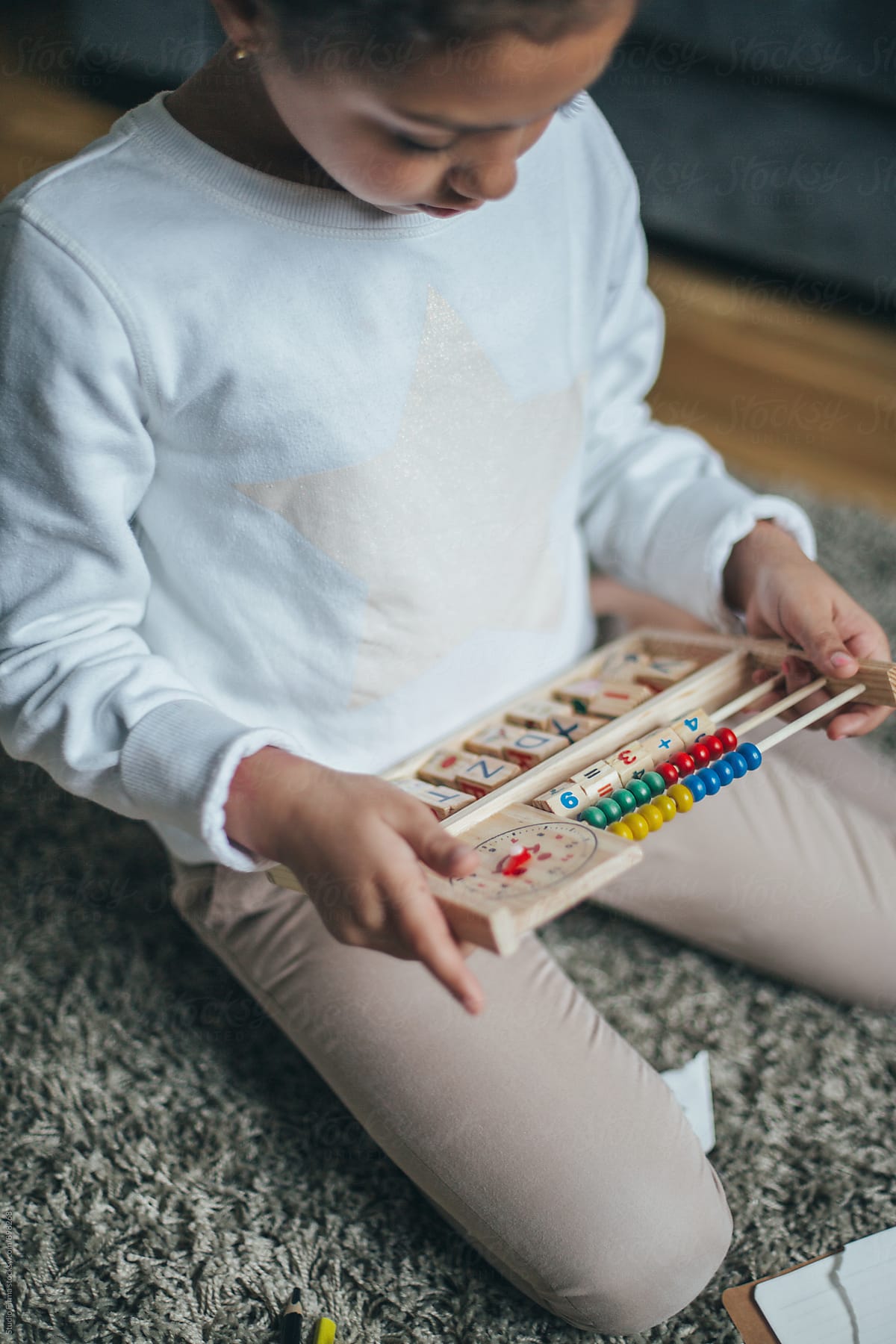 "Learning To Count" by Stocksy Contributor "Studio Firma" - Stocksy
