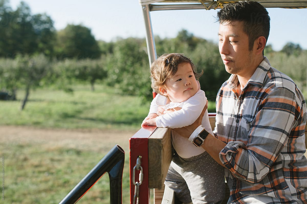 "Dad With Baby Daughter At Farm" by Stocksy Contributor "Lauren Lee ...