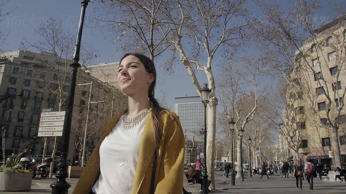 "Woman Walking In The City Centre." by Stocksy Contributor "Guille ...
