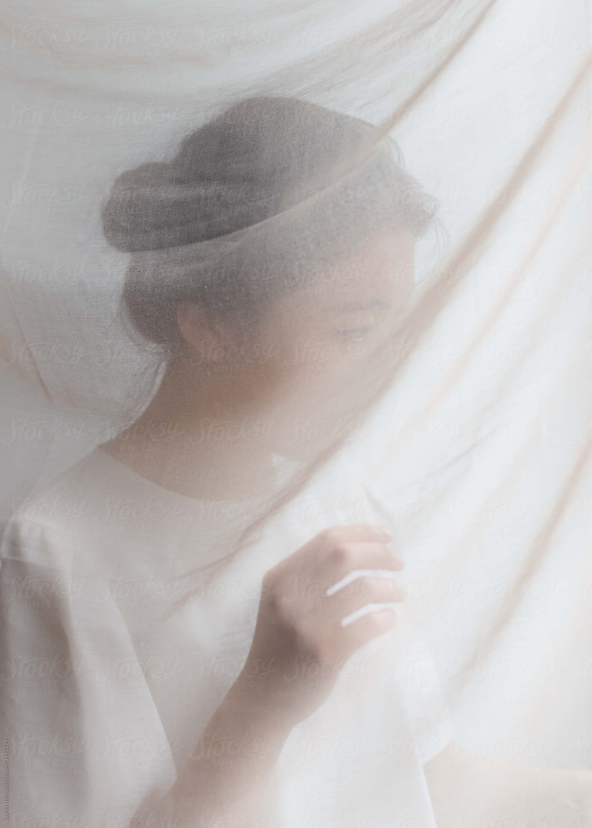 "Portrait Of Girl Standing Behind Silk Scarf" by Stocksy Contributor ...