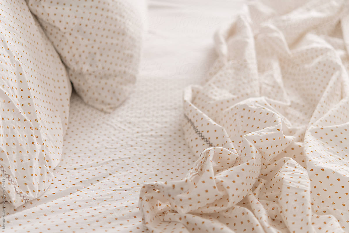 "Cozy Bed" by Stocksy Contributor "Melanie DeFazio" - Stocksy