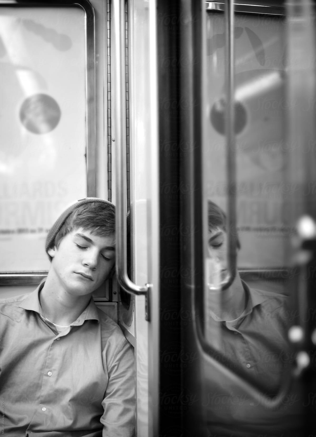 "Teenage Boy In The Subway" by Stocksy Contributor "Marcel" - Stocksy