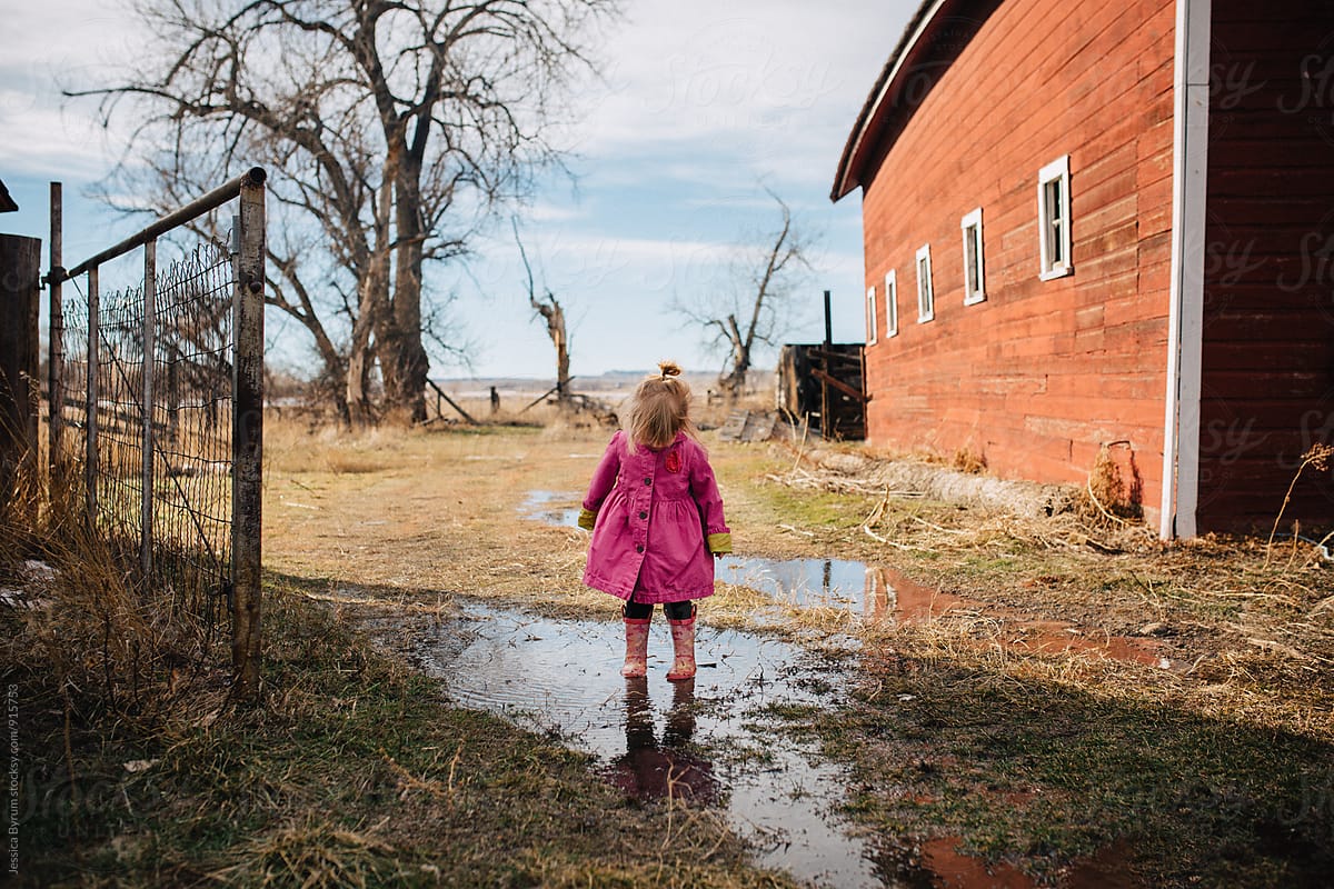 "Toddler Girl Standing In Puddle" by Stocksy Contributor "Jessica Byrum ...