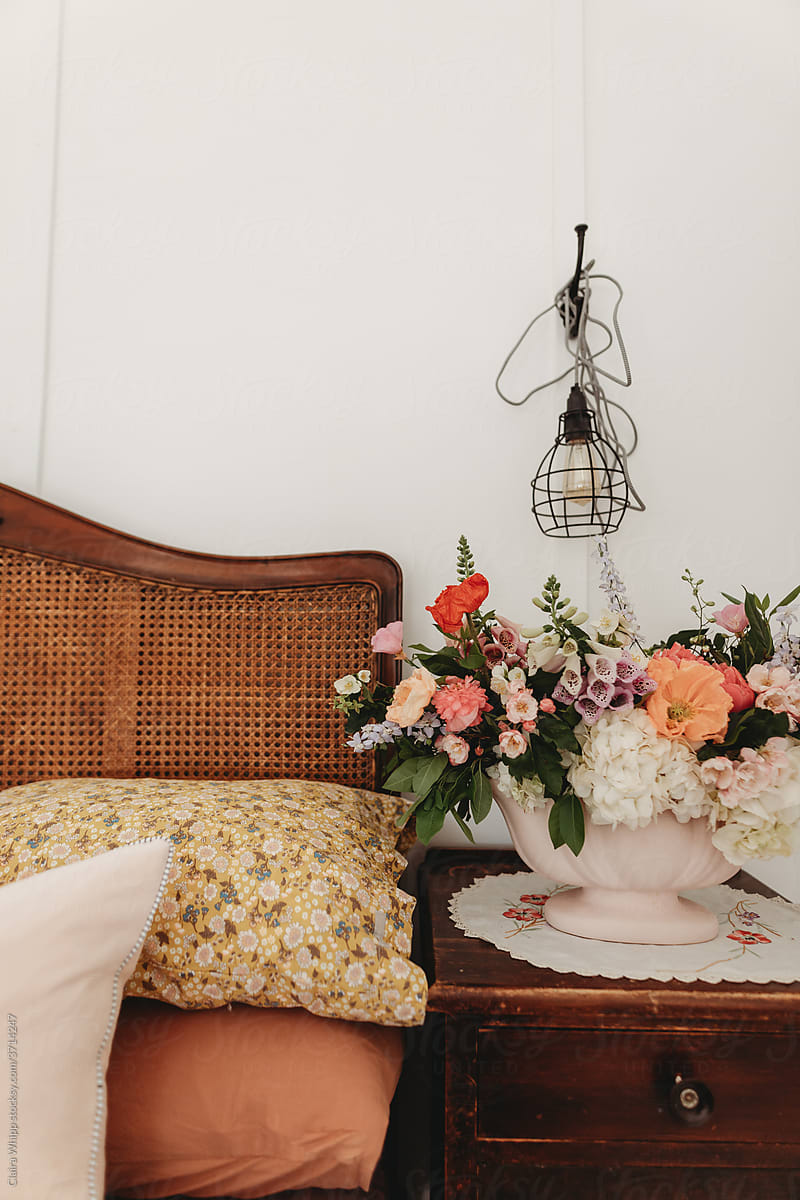 "Flowers On Bedside Table" by Stocksy Contributor "Claira Whipp" - Stocksy