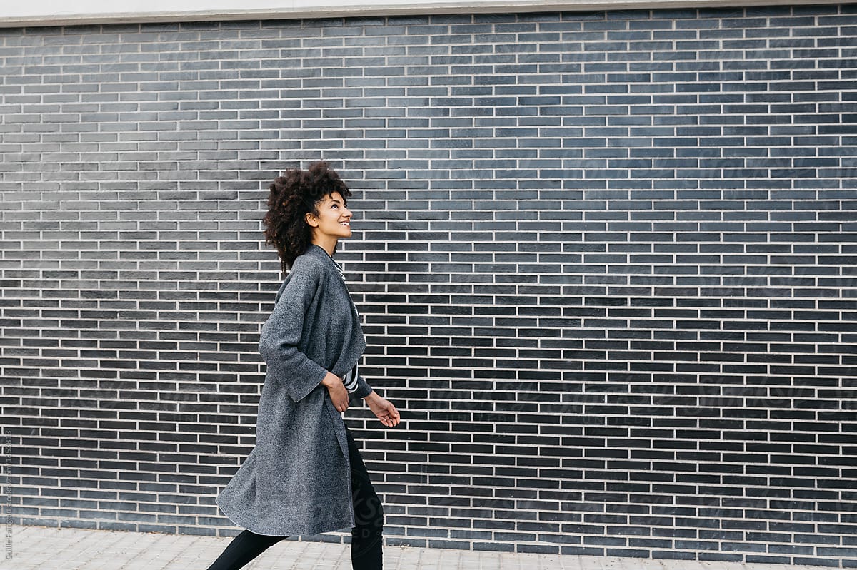 "Attractive Businesswoman Walking" by Stocksy Contributor "Guille ...