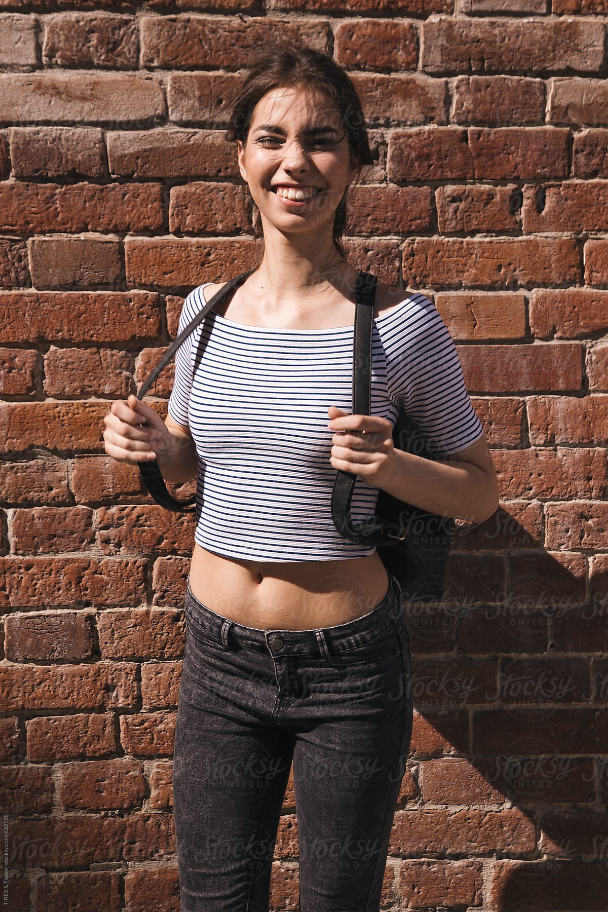 "Girl With Backpack" by Stocksy Contributor "Danil Nevsky" - Stocksy