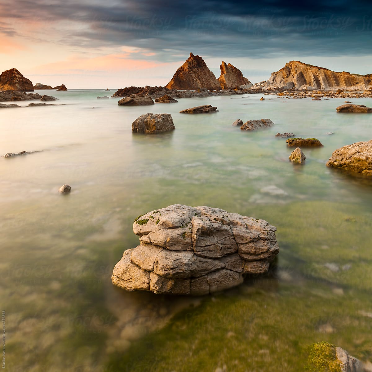 "Dusk On A Beautiful Coastline" by Stocksy Contributor "Marilar ...