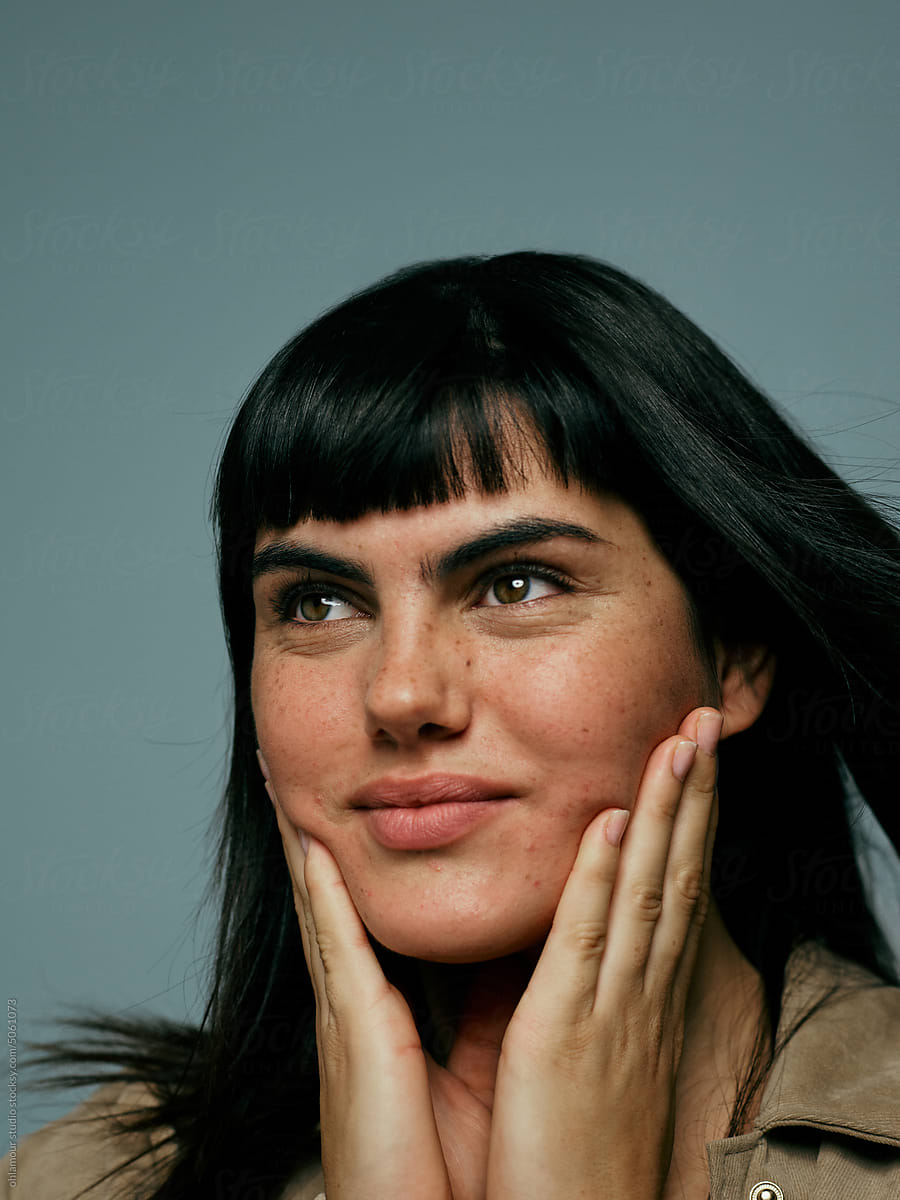 "Hopeful Woman Portrait" by Stocksy Contributor "Leandro Crespi" - Stocksy