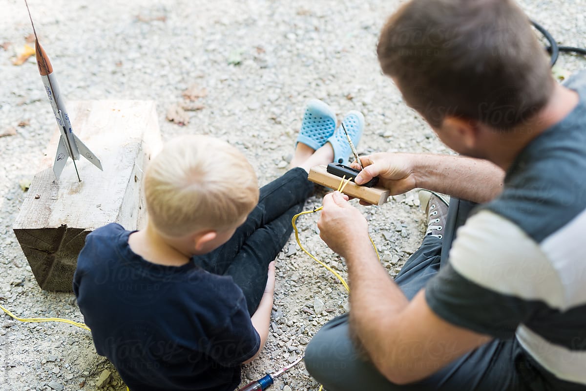 "Creative Father And Son Rocket Scientist Building Home Made Model ...
