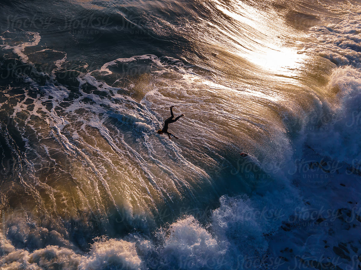 "A Surfer Jumping Off A Wave" by Stocksy Contributor "Single Fin Photo ...