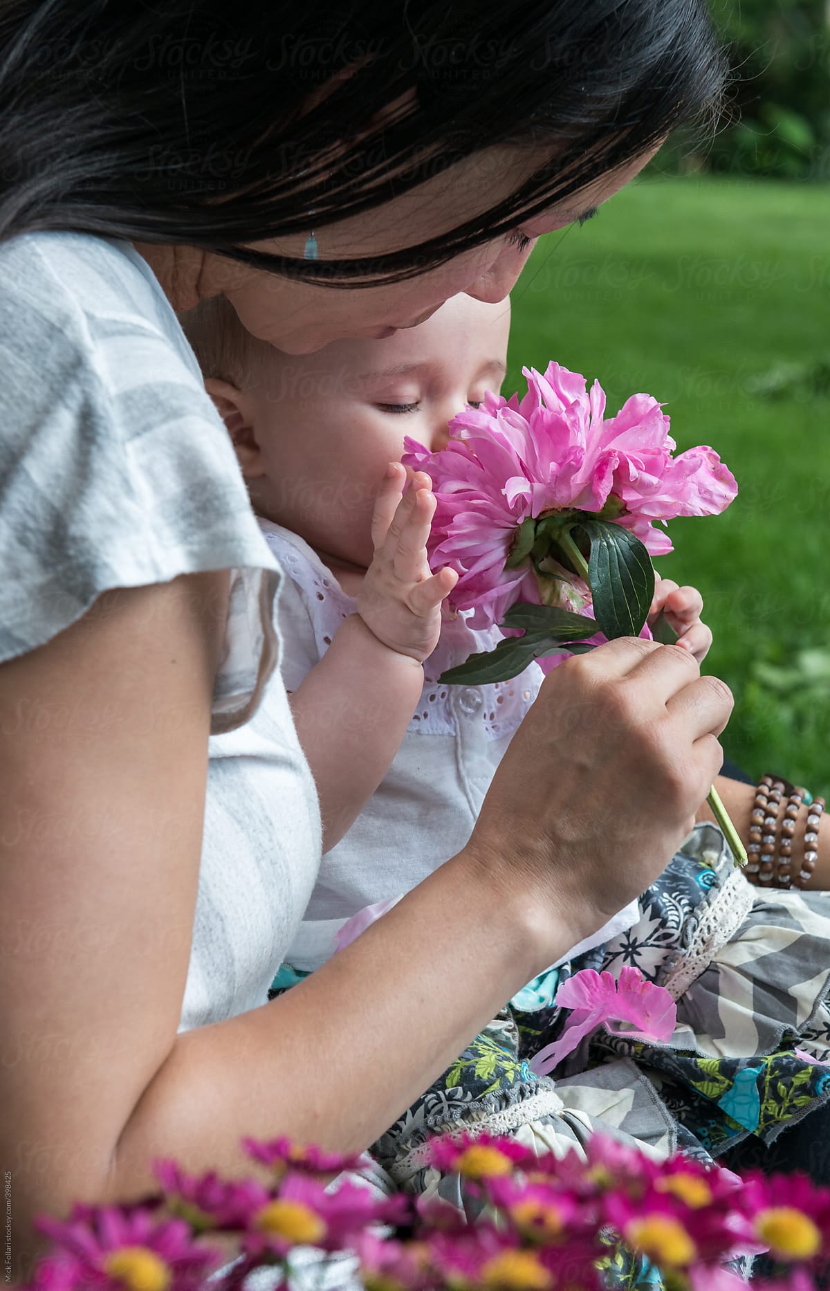 Baby Smelling Flowers Baby Smelling Flower Hi Res Stock Photography