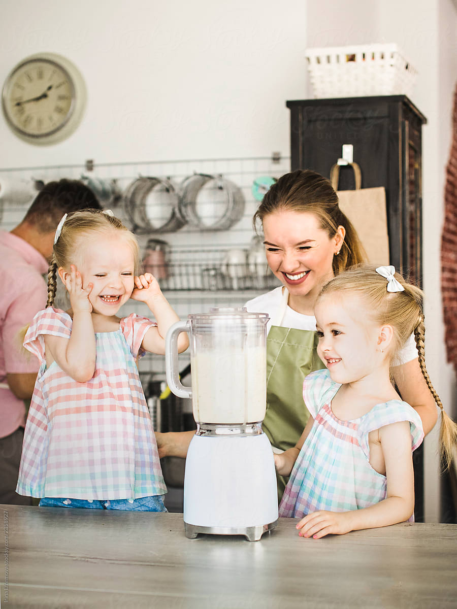 "Family Of Four Making A Smoothie" by Stocksy Contributor "Irina ...