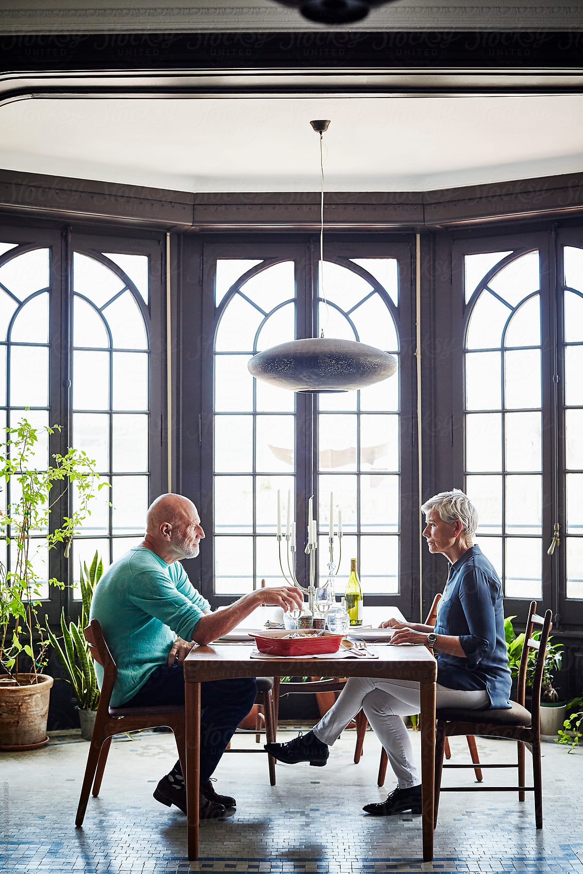 "Senior Couple Having Lunch At Dining Table" by Stocksy Contributor ...